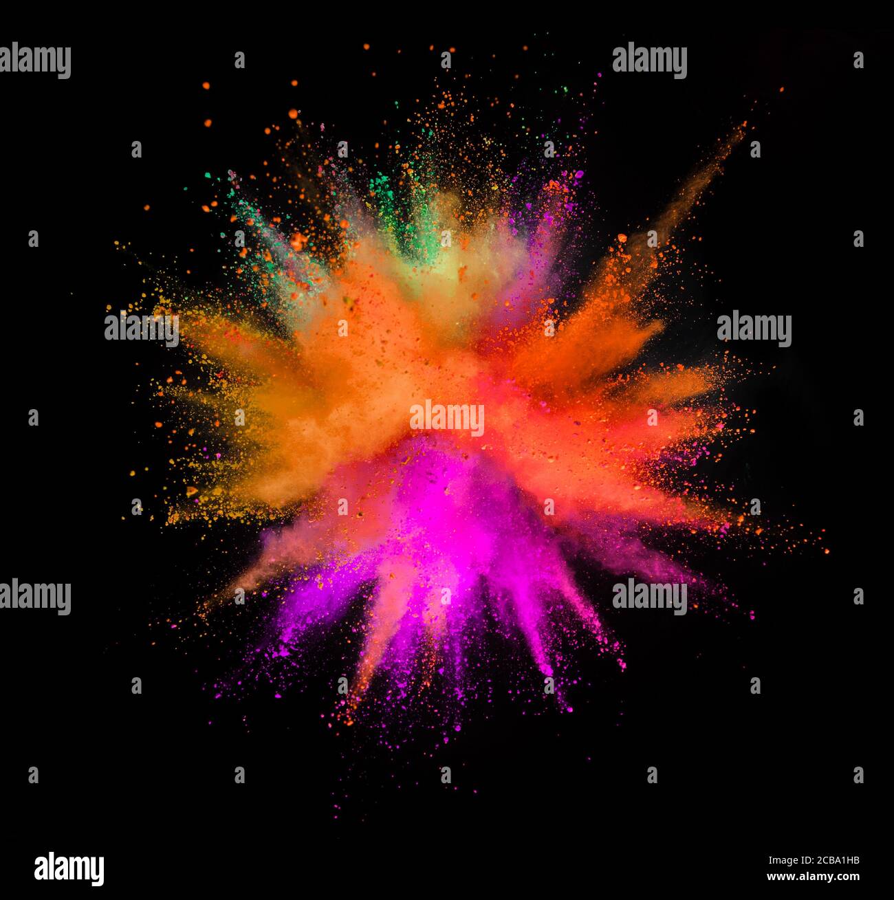 Multi colored powder explosion isolated on black background. Freeze ...