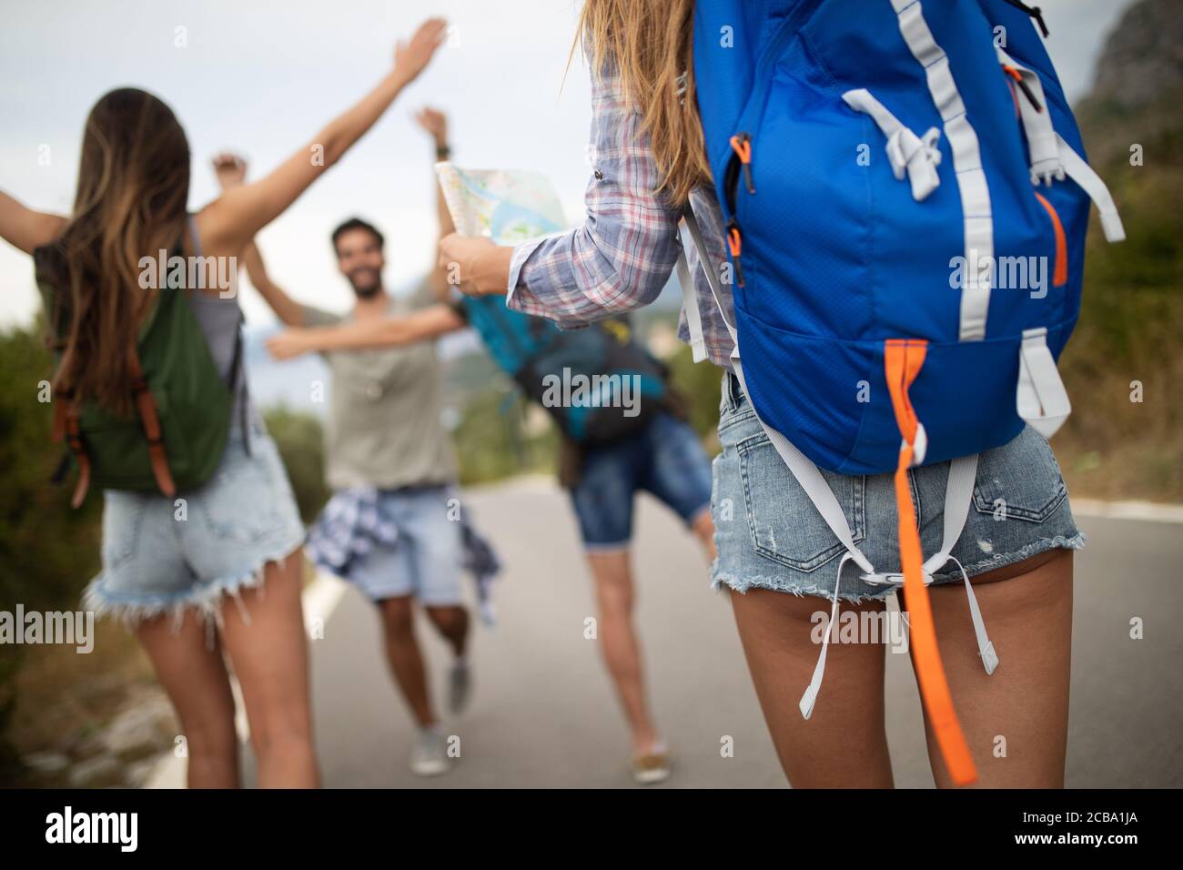 Group of happy friend traveler walking and having fun. Travel lifestyle ...