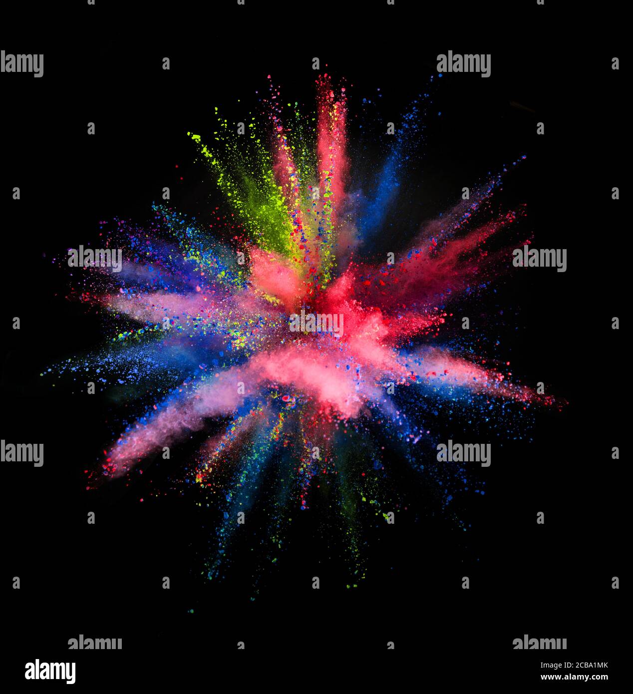 Multi colored powder explosion isolated on black background. Freeze ...
