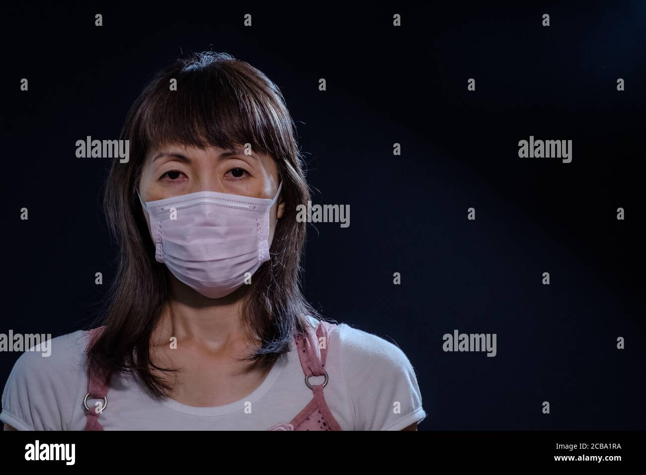 Pink mask girl Stock Photo - Alamy