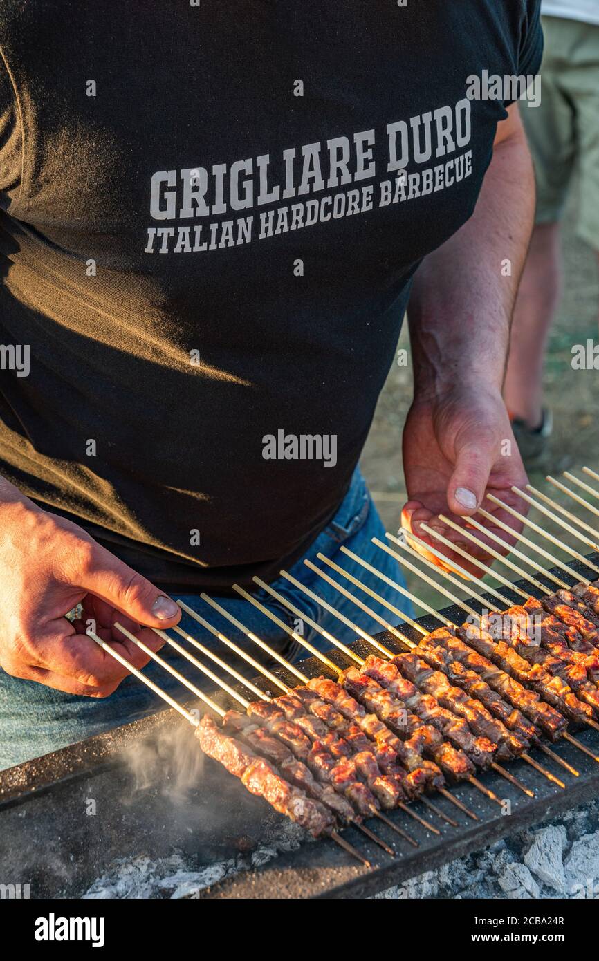 Cooking arrosticini, grill outdoor, roasted sheep. Abruzzo, Italy Stock ...