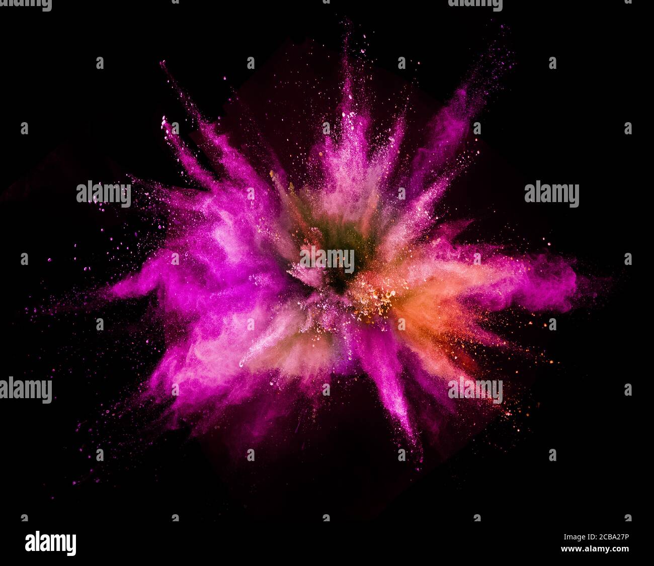 Explosion of colored powder isolated on black background. Abstract ...