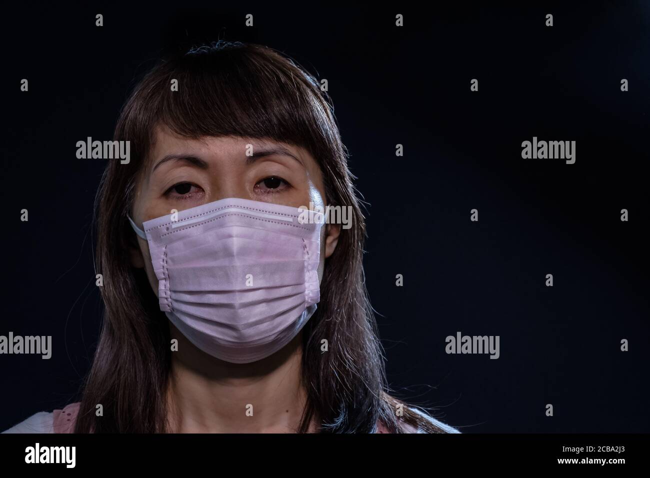 Pink mask girl Stock Photo - Alamy