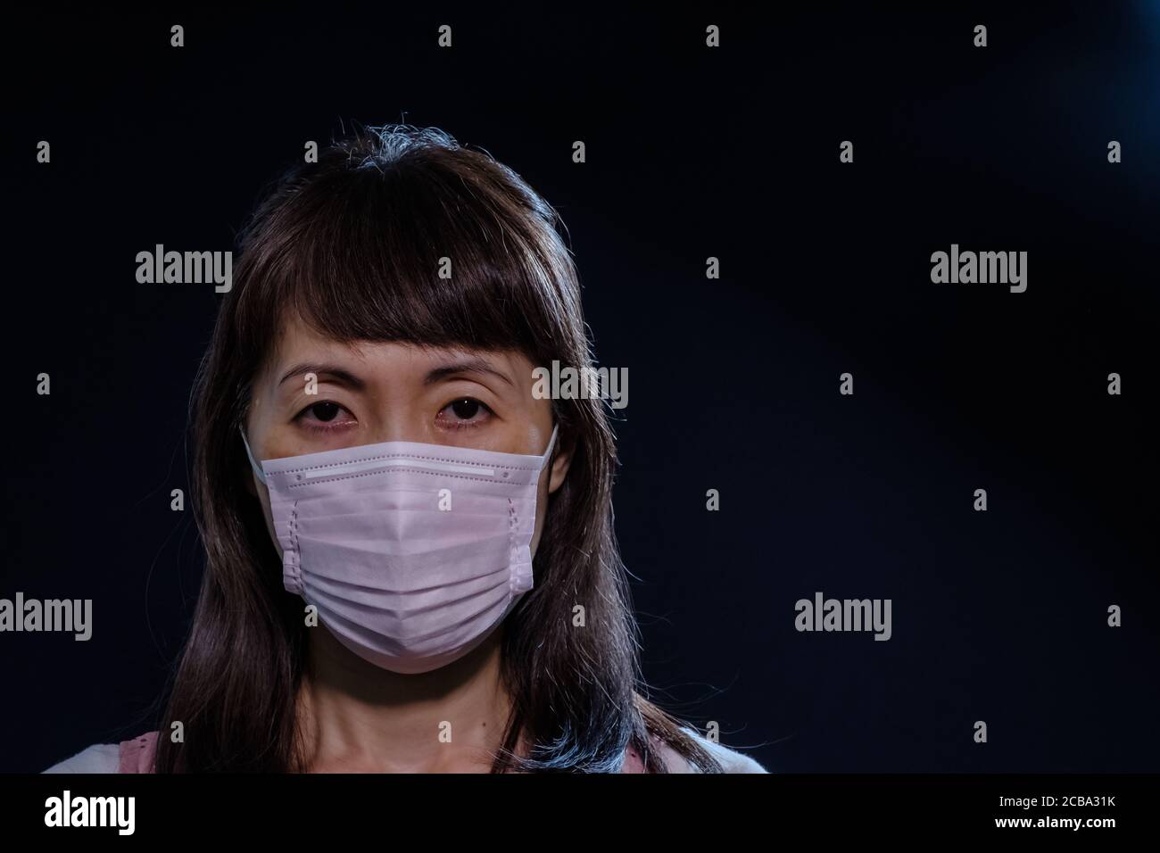 Pink mask girl Stock Photo - Alamy