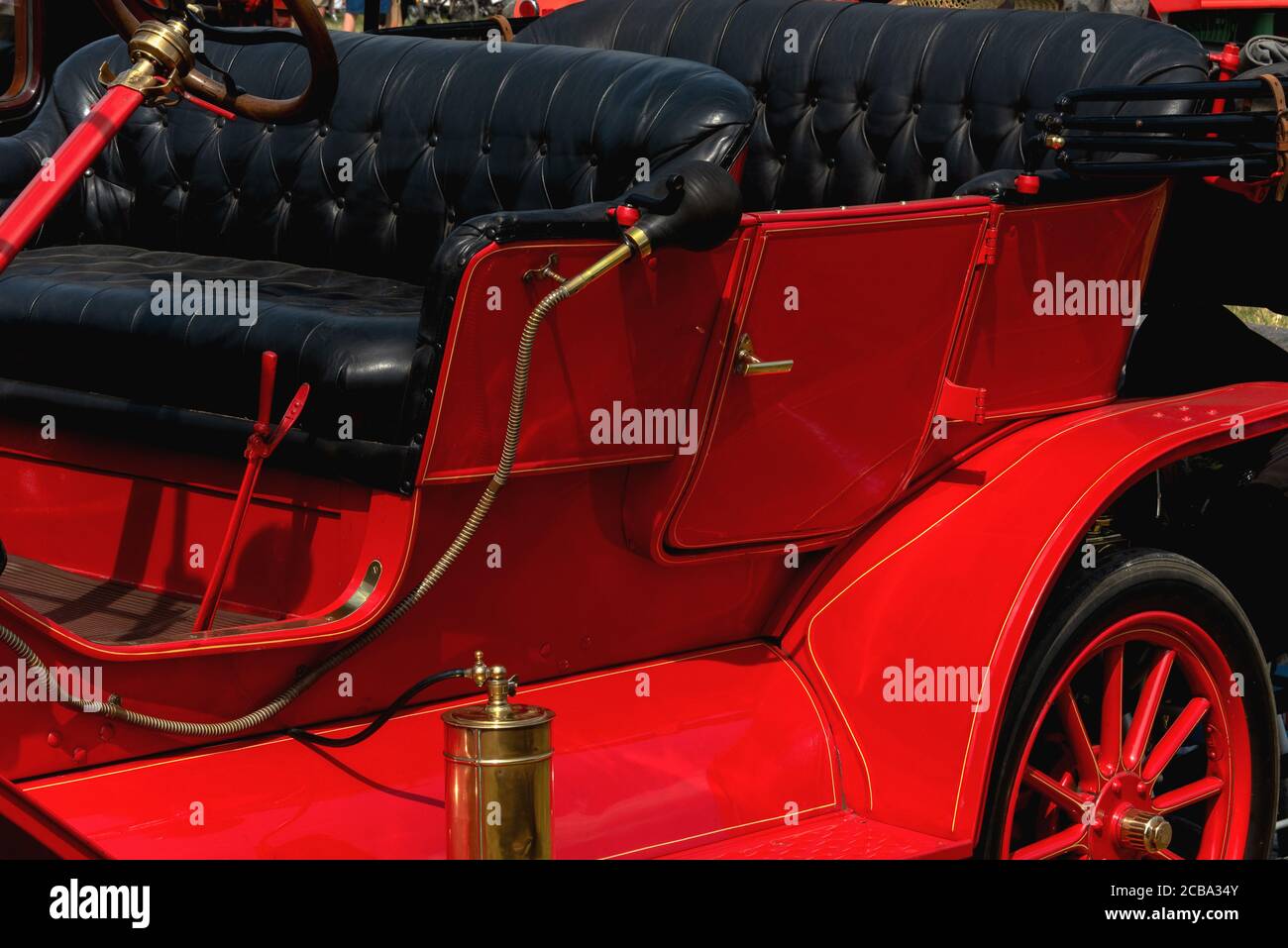 Bright red coachwork gleams in July sunshine on Model ‘T’ Ford EL 1776 ...