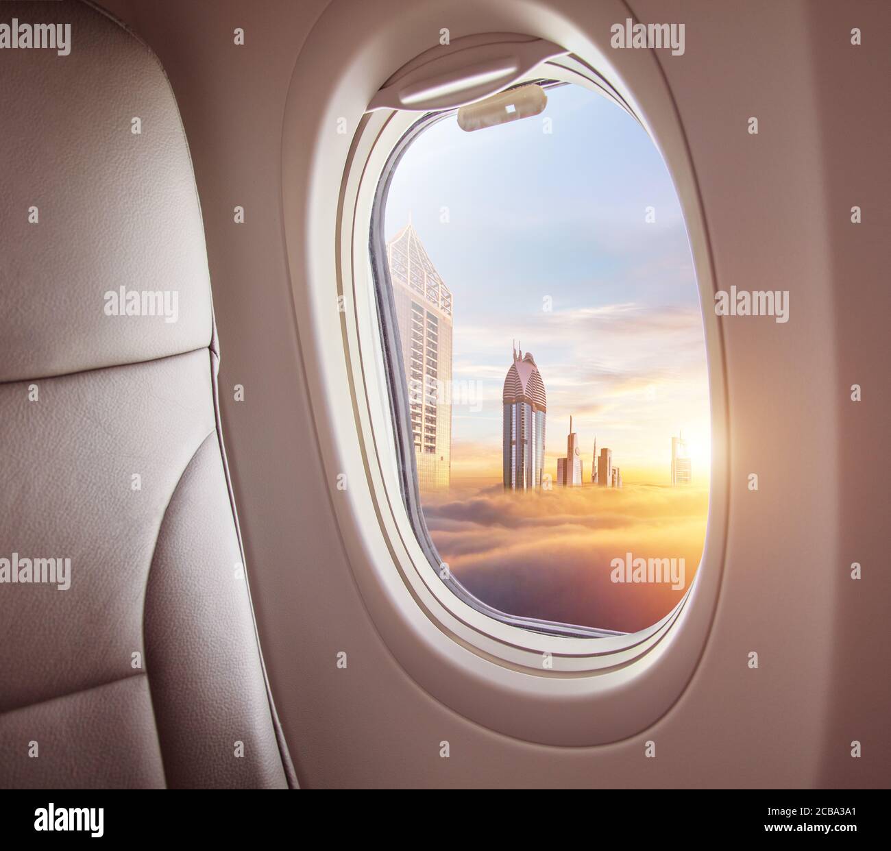 Airplane interior with window view of Dubai city, UAE. Concept of ...