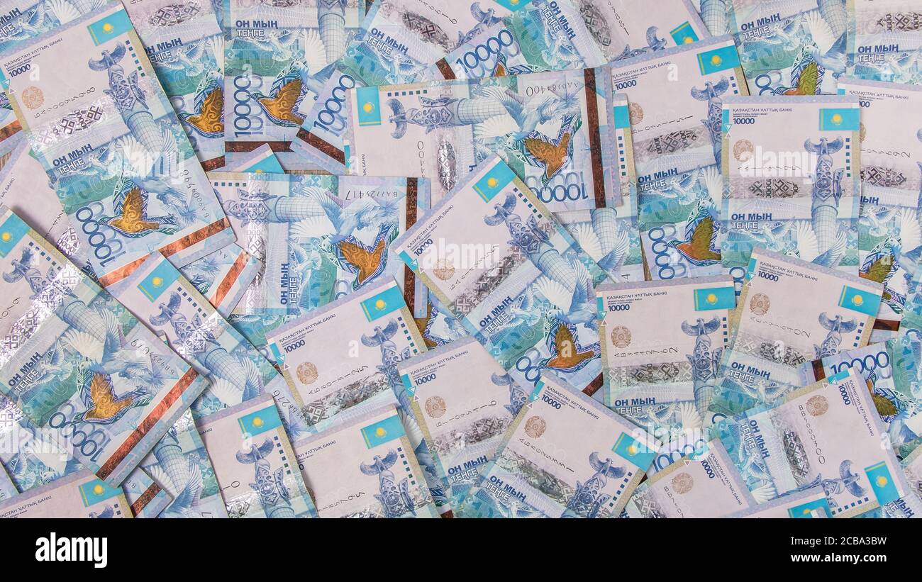 Background in Kazakhstani tenge. A lot of Kazakhstan money. Sawing the ...