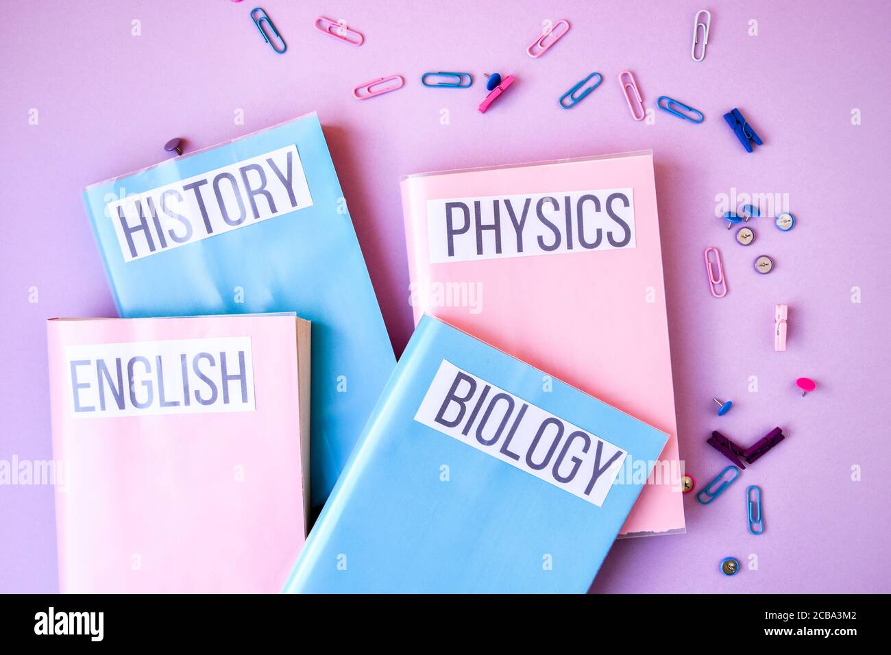 School subject books with supplies on color background, back to school ...