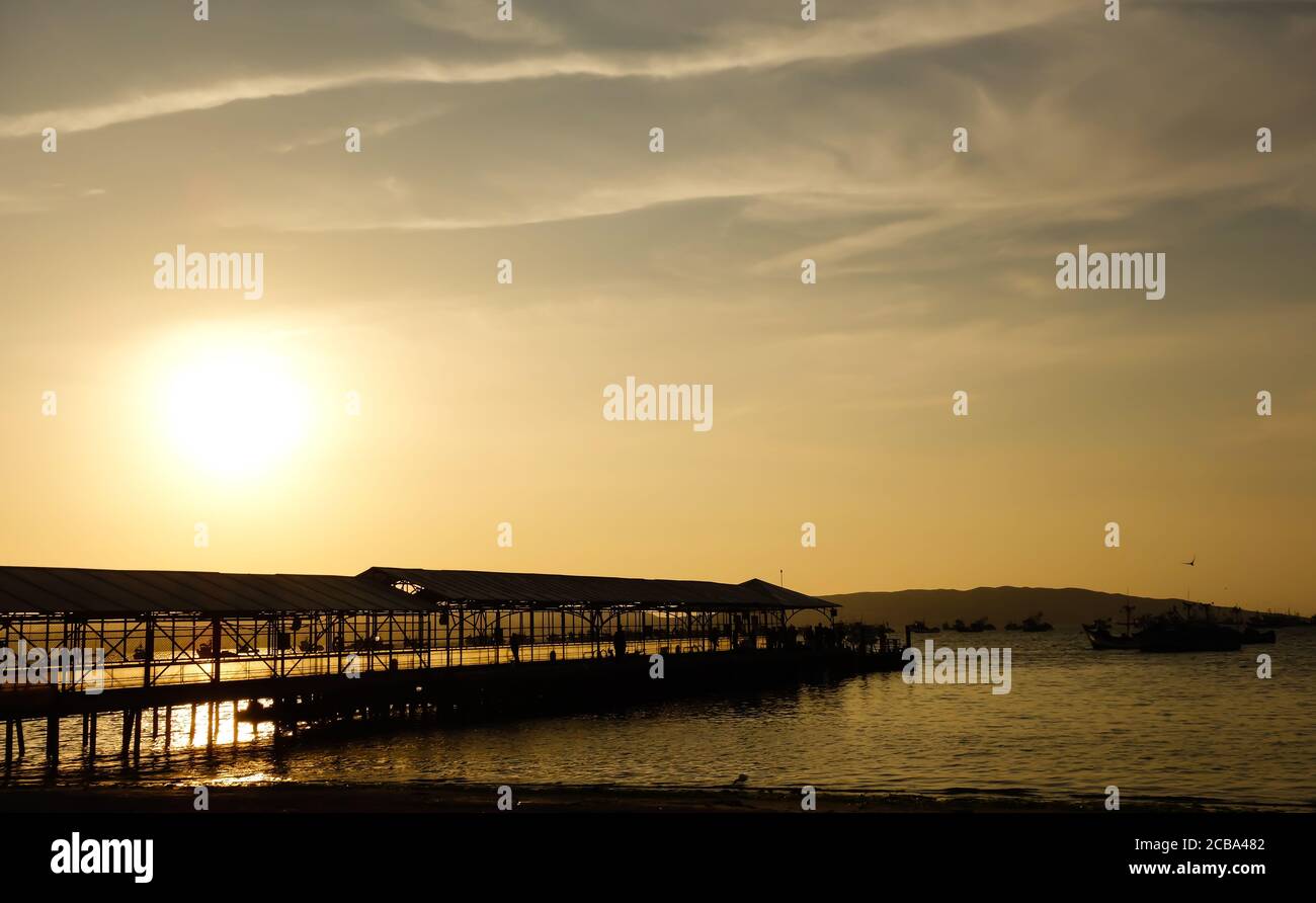 Deck on the beach of Paracas, Peru at sunset Stock Photo - Alamy