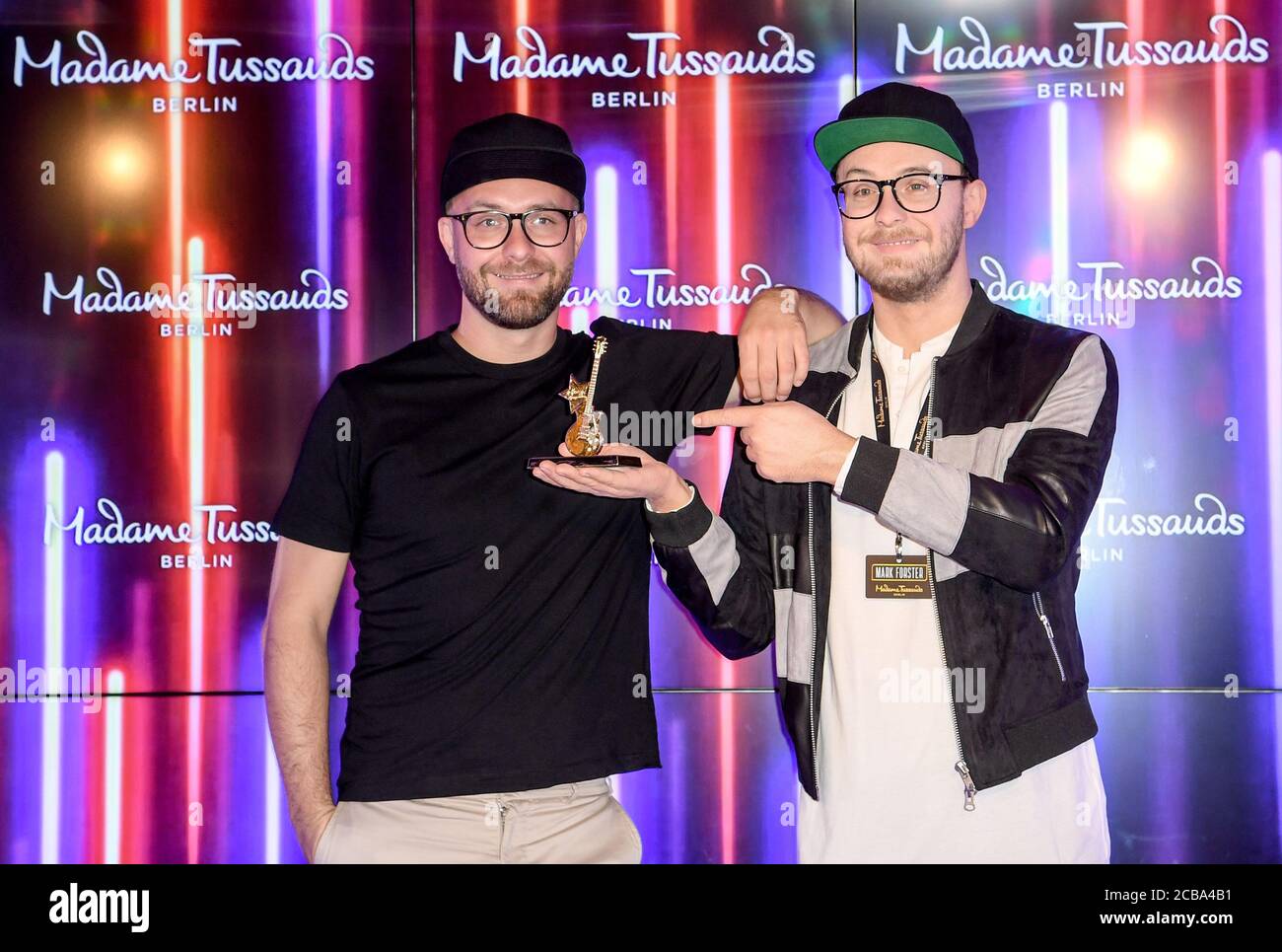 Berlin, Germany. 12th Aug, 2020. The musician Mark Forster (l) stands ...