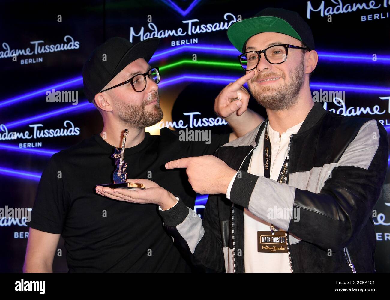 Berlin, Germany. 12th Aug, 2020. The musician Mark Forster (l) stands ...