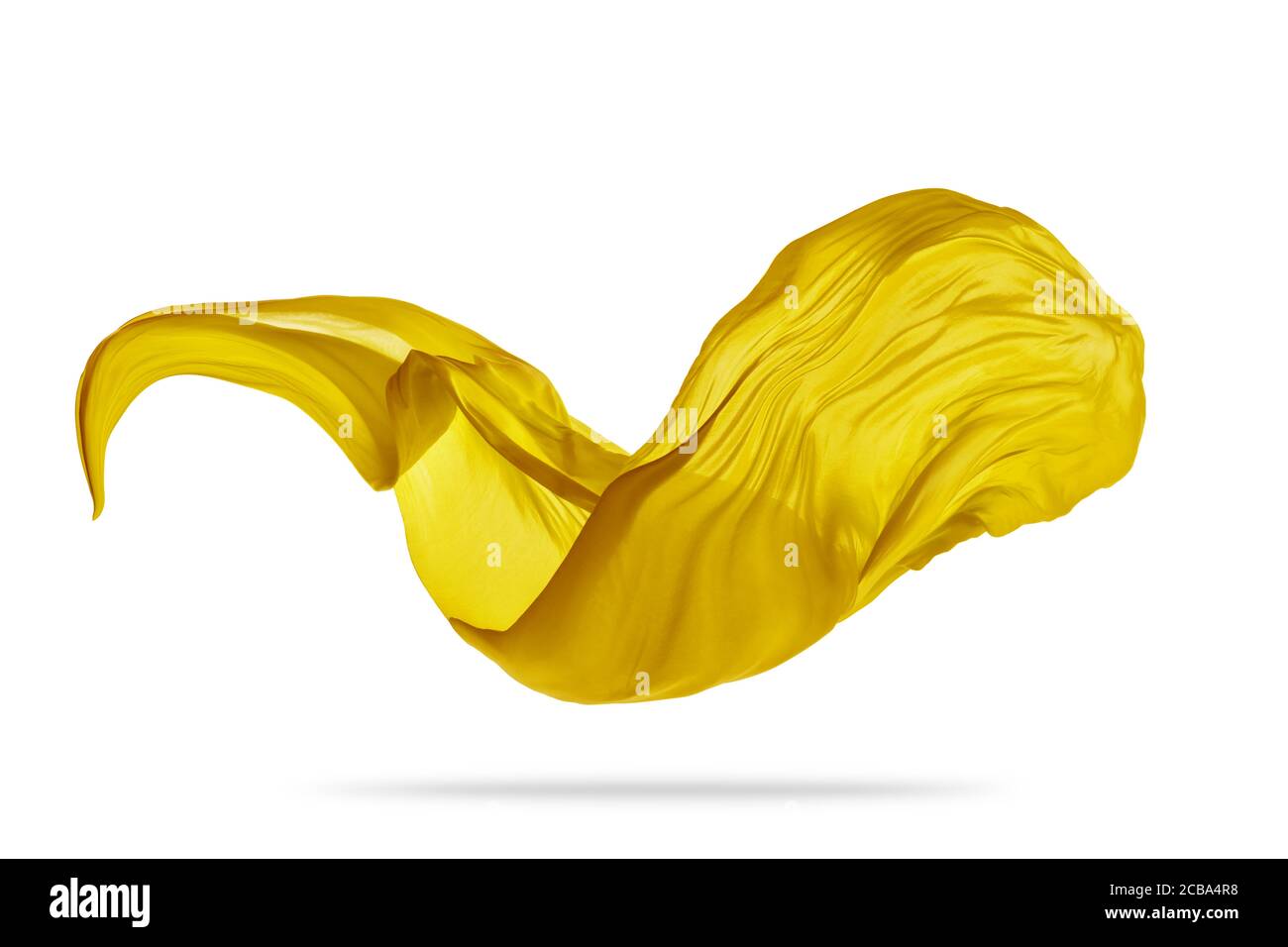 Piece of flying golden cloth isolated on white background. High ...