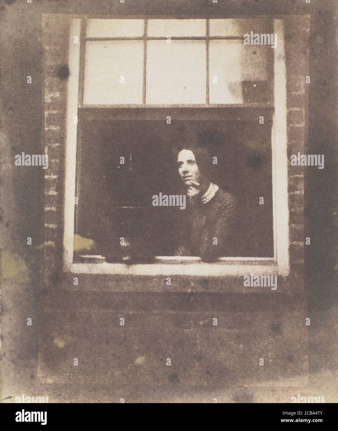 Lady in Open Window with Bird Cage, late 1840s Stock Photo - Alamy