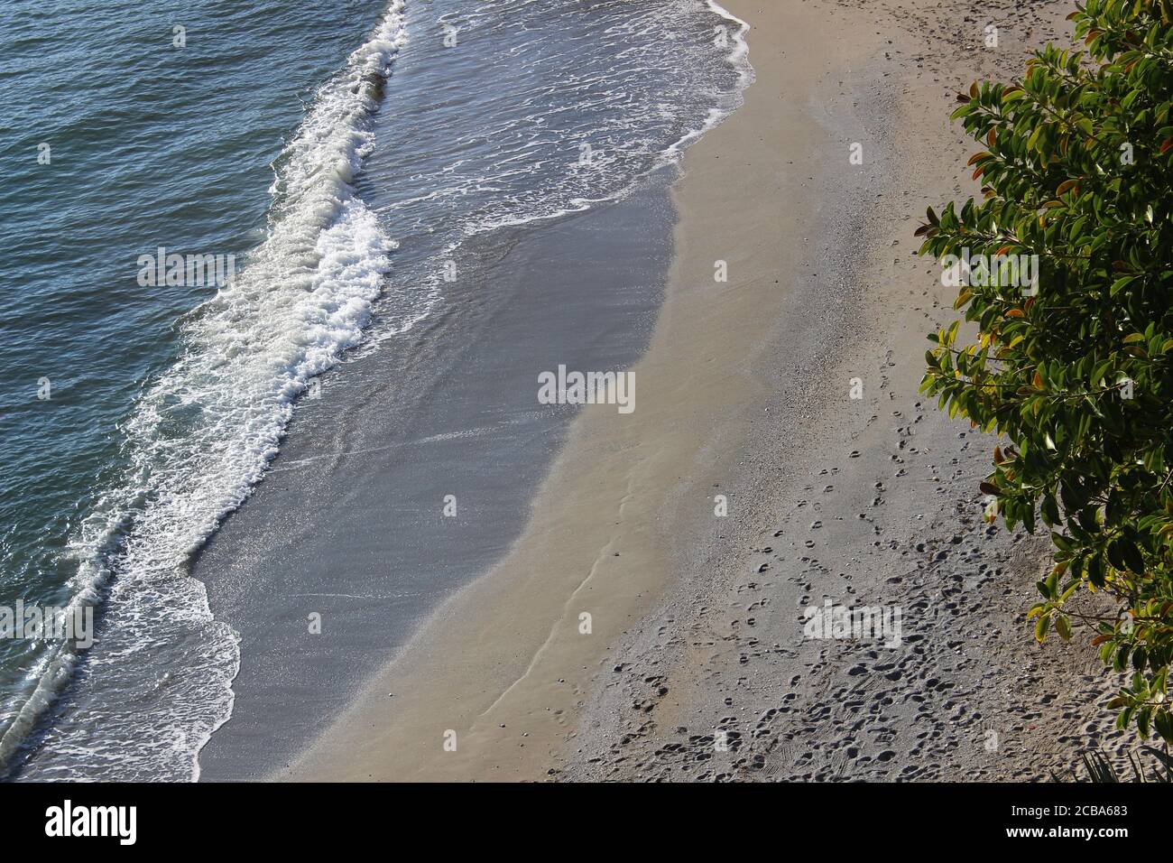 Aerial view of an empty, tropical beach on a peaceful day Stock Photo ...