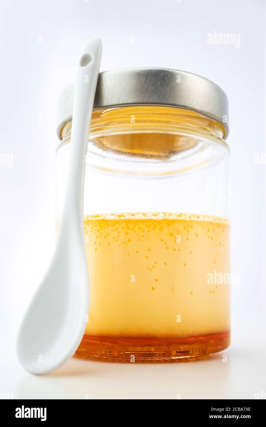 Cream caramel in a jar isolated on white background Stock Photo - Alamy