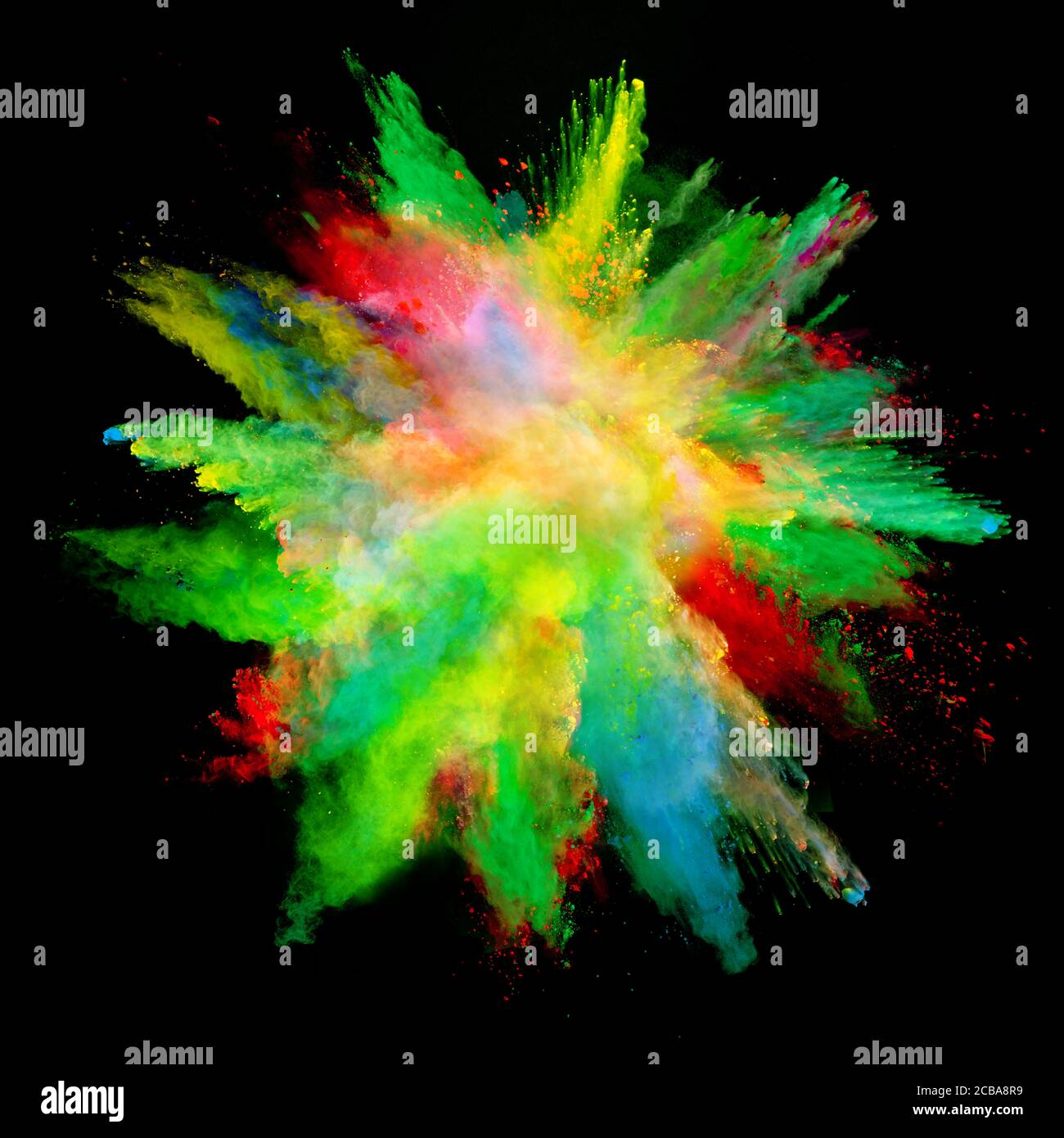Abstract colored powder explosion isolated on black background. High ...