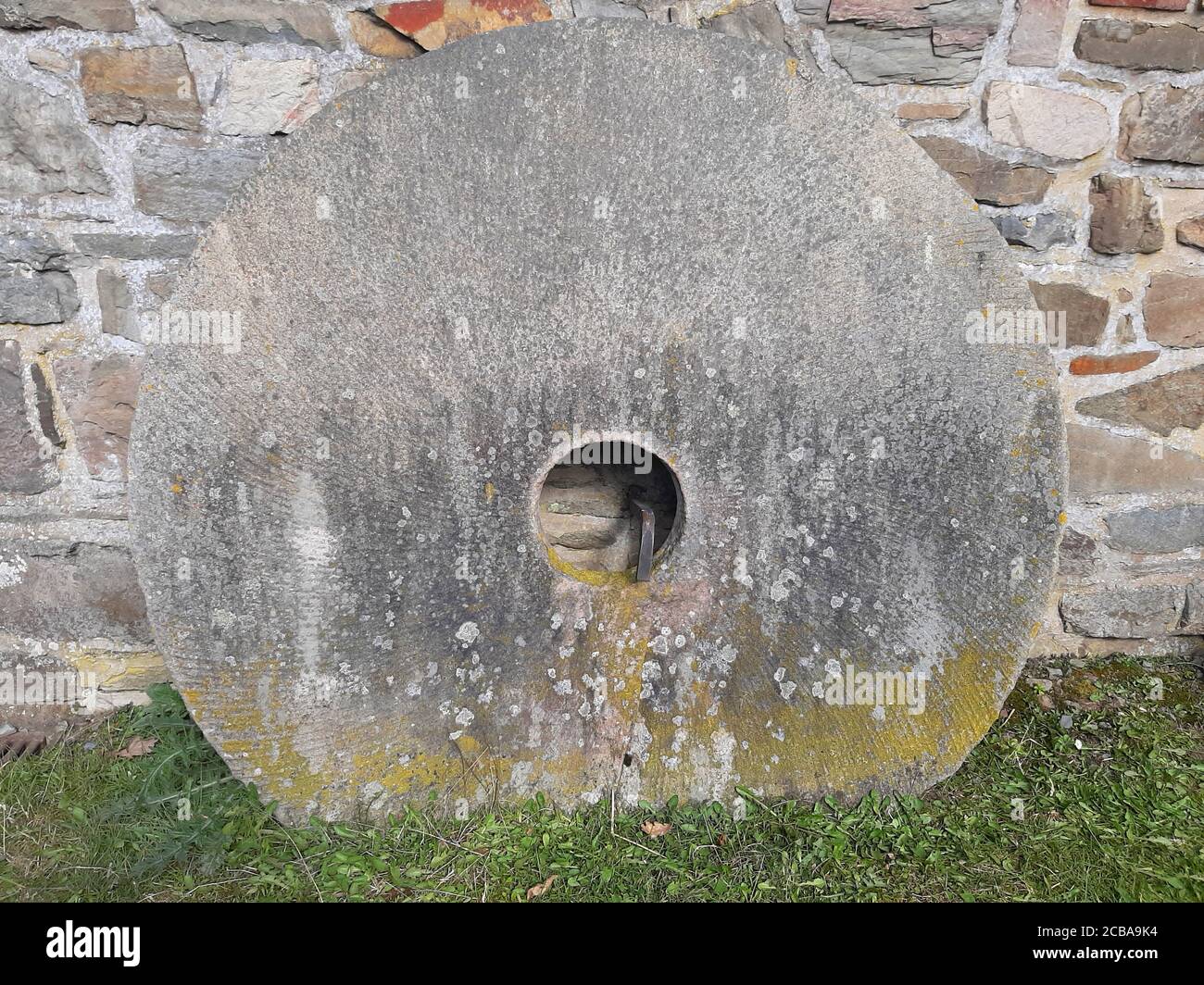 old millstone at an oil mill, Germany Stock Photo - Alamy