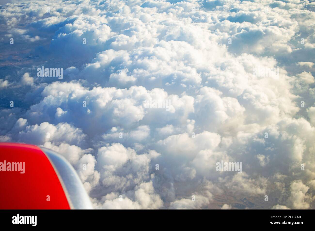 Wonderful view of the clouds from the airplane window Stock Photo - Alamy