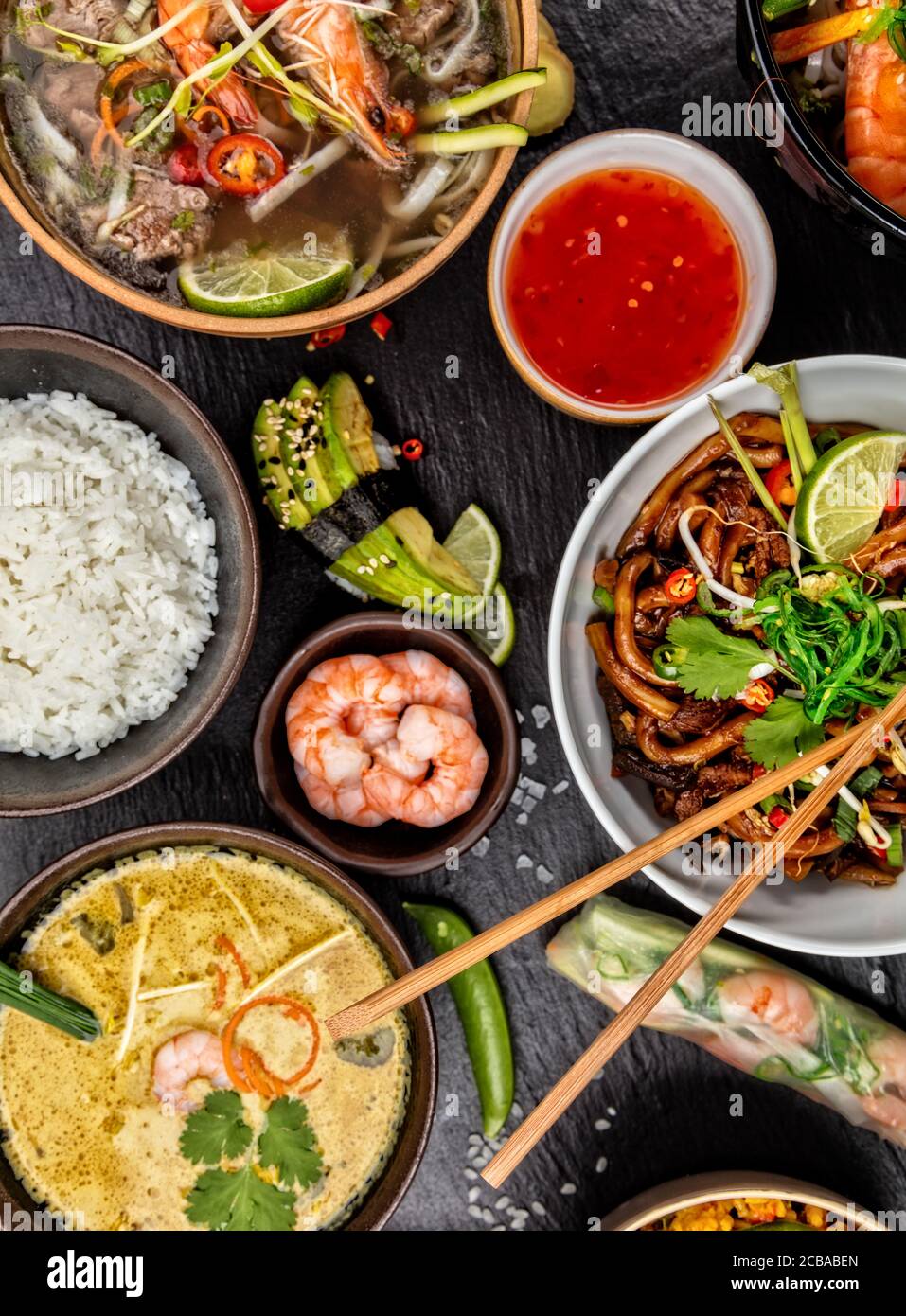 Asian food variation with many kinds of meals. Kari rice, noodles and ...