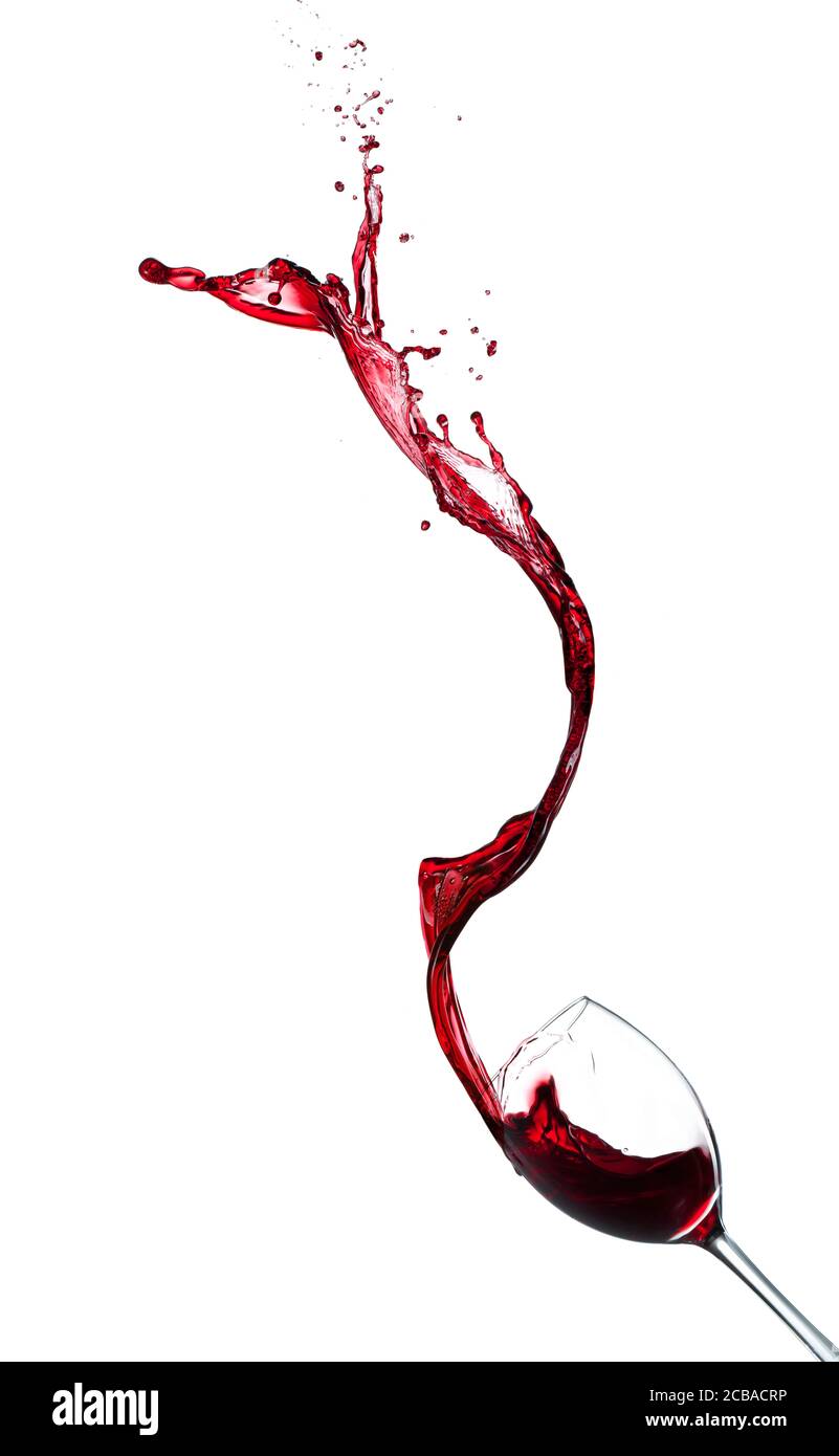 Red wine splashing from glass, isolated on white background. High ...