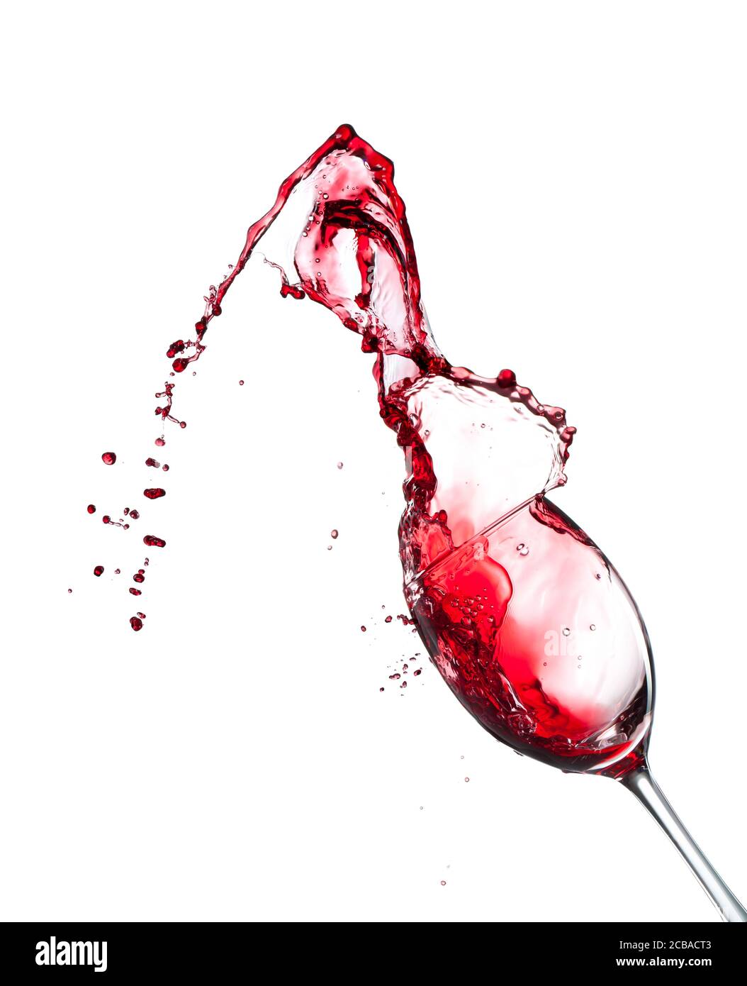 Red wine splashing from glass, isolated on white background. High ...