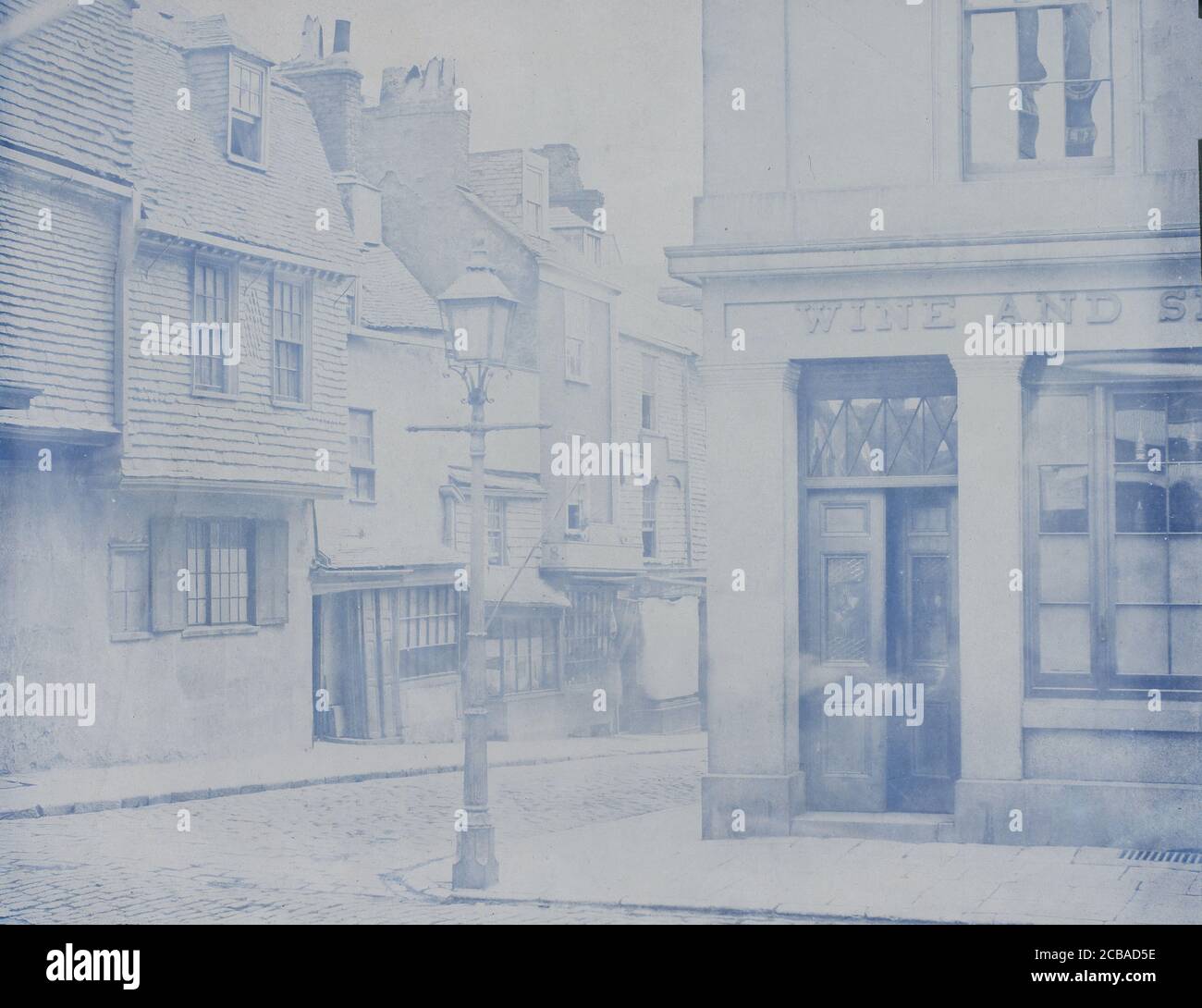 [Street with Lamp Post and Wine Shop], 1850s Stock Photo - Alamy