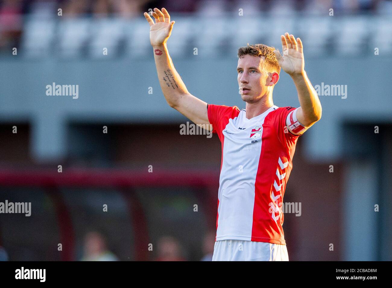 Sinan Bakis signs a contract at Heracles Almelo Stock Photo - Alamy