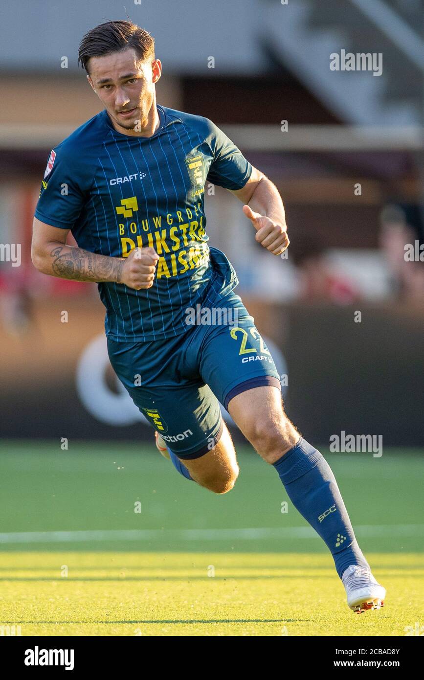 Sinan Bakis signs a contract at Heracles Almelo Stock Photo - Alamy