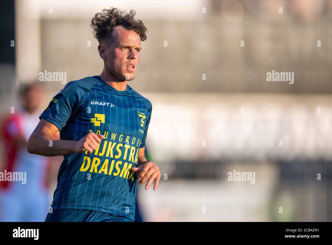 Sinan Bakis signs a contract at Heracles Almelo Stock Photo - Alamy