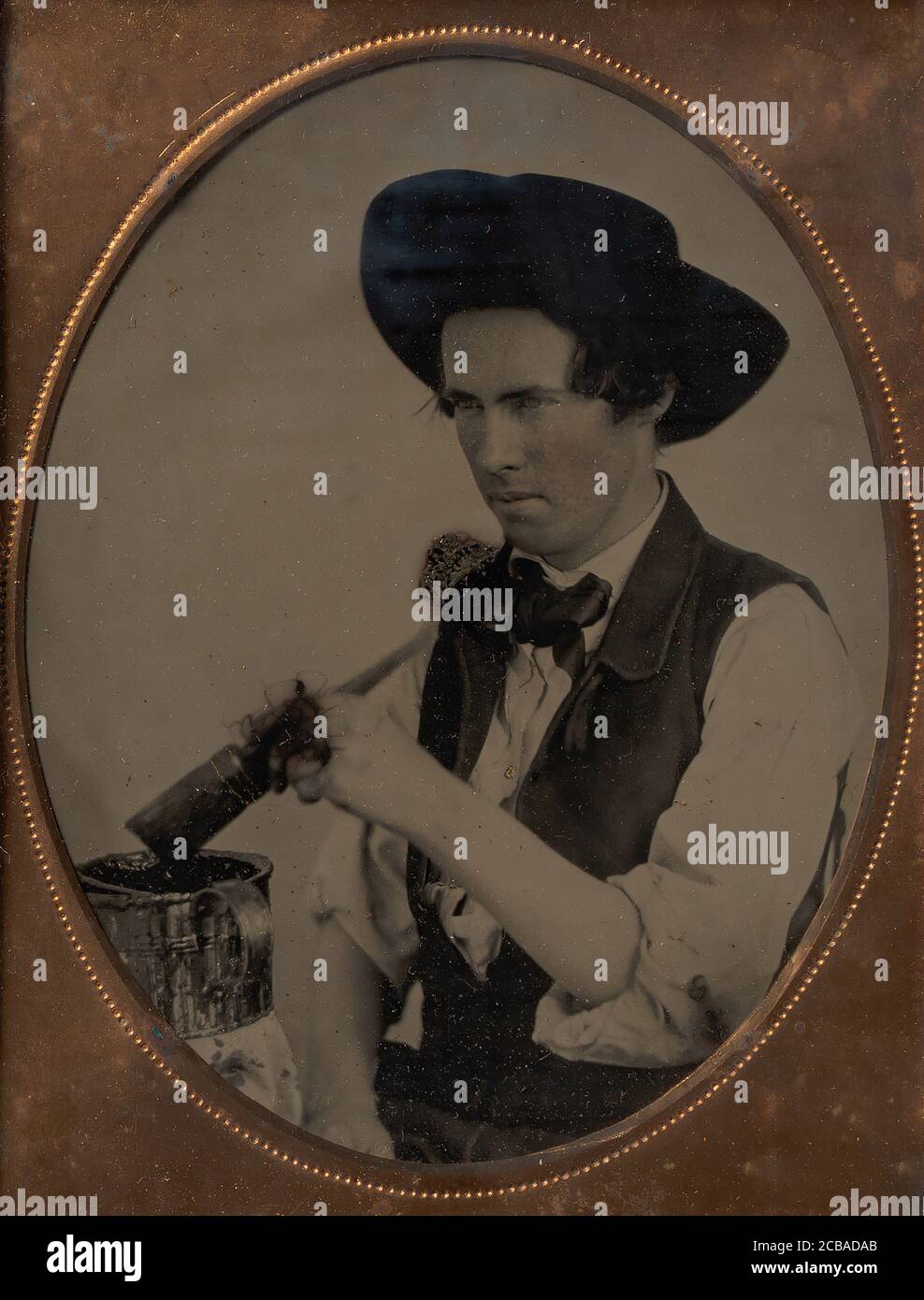 Painter Dipping Brush into Paint Jug, late 1850s-60s Stock Photo - Alamy