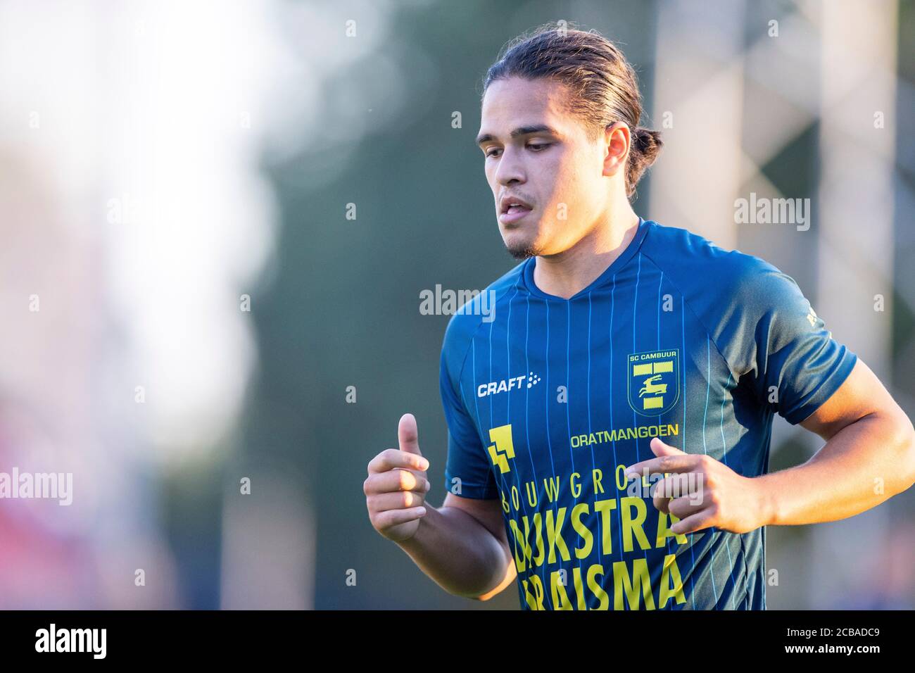 Sinan Bakis signs a contract at Heracles Almelo Stock Photo - Alamy