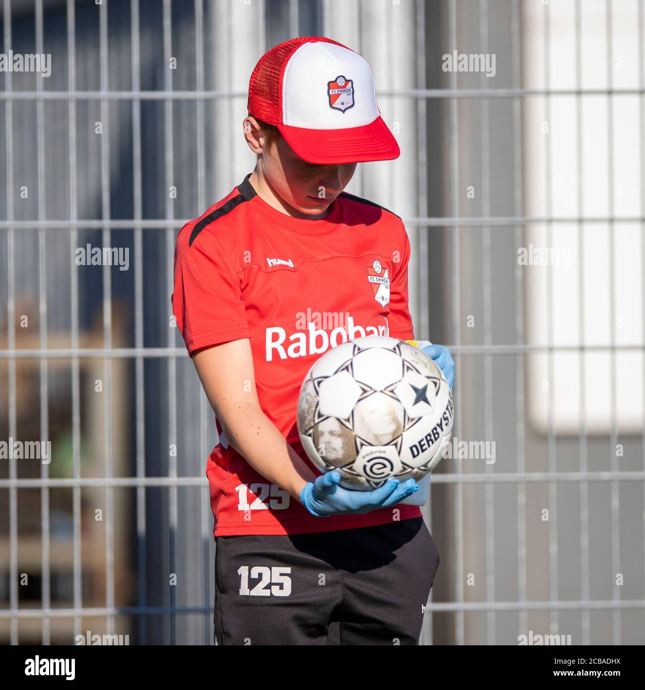 Sinan Bakis signs a contract at Heracles Almelo Stock Photo - Alamy