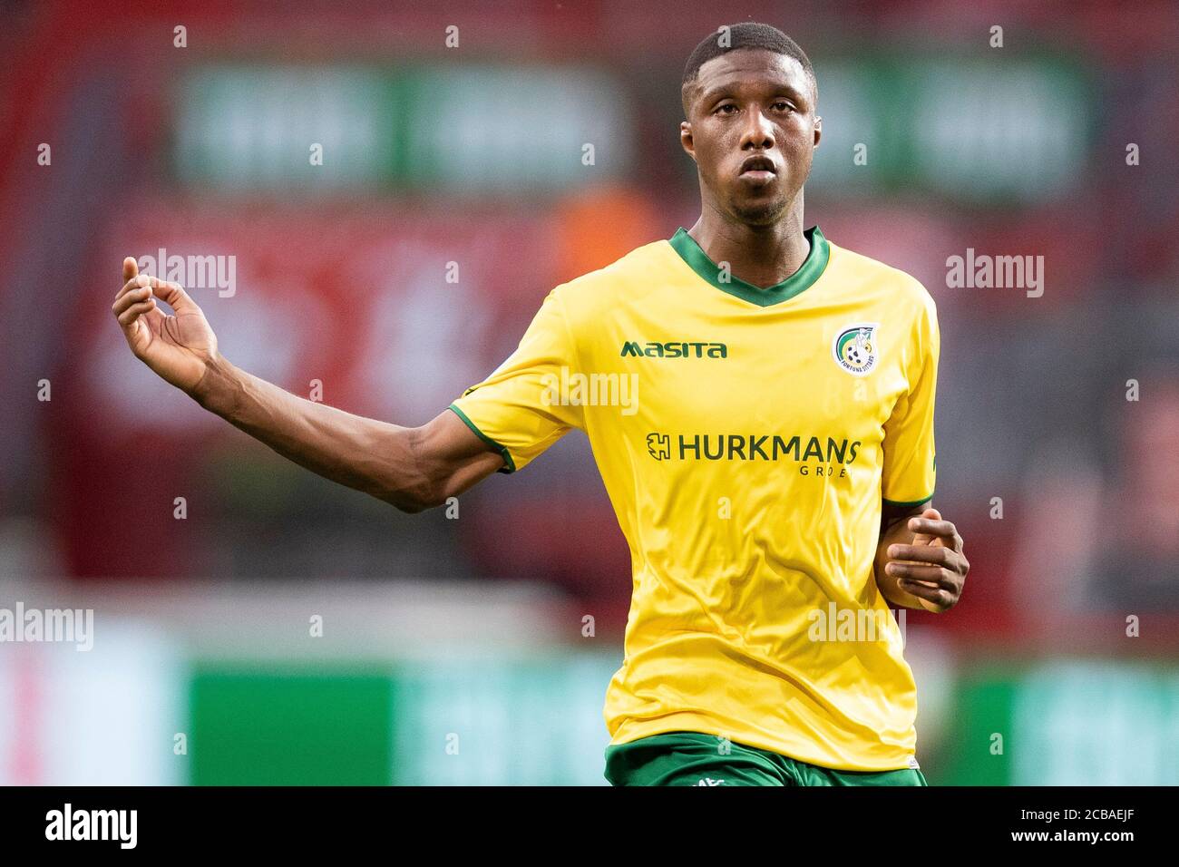 Sinan Bakis signs a contract at Heracles Almelo Stock Photo - Alamy