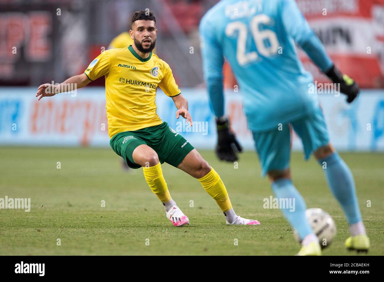 Sinan Bakis signs a contract at Heracles Almelo Stock Photo - Alamy