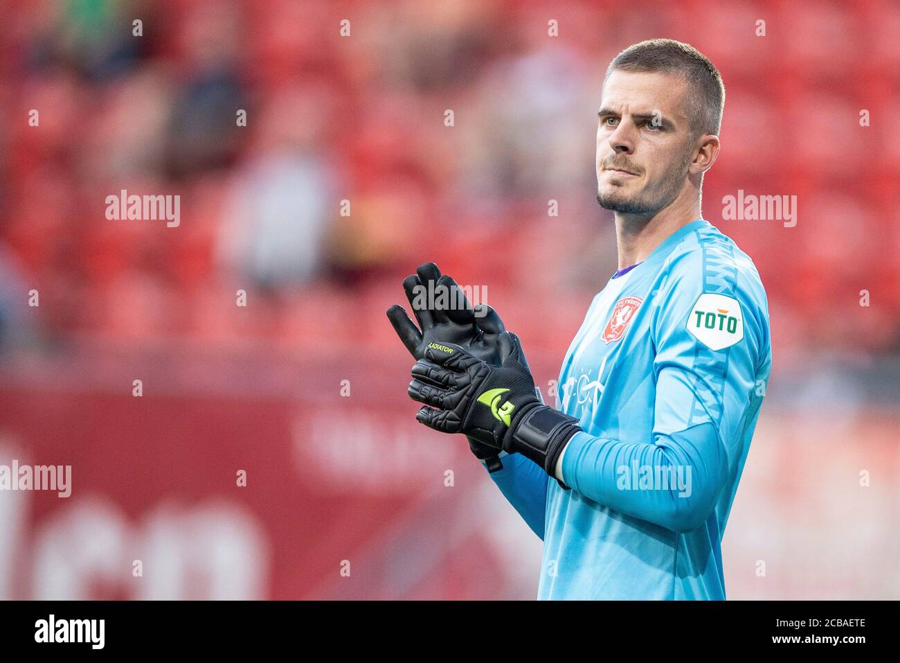 Sinan Bakis signs a contract at Heracles Almelo Stock Photo - Alamy