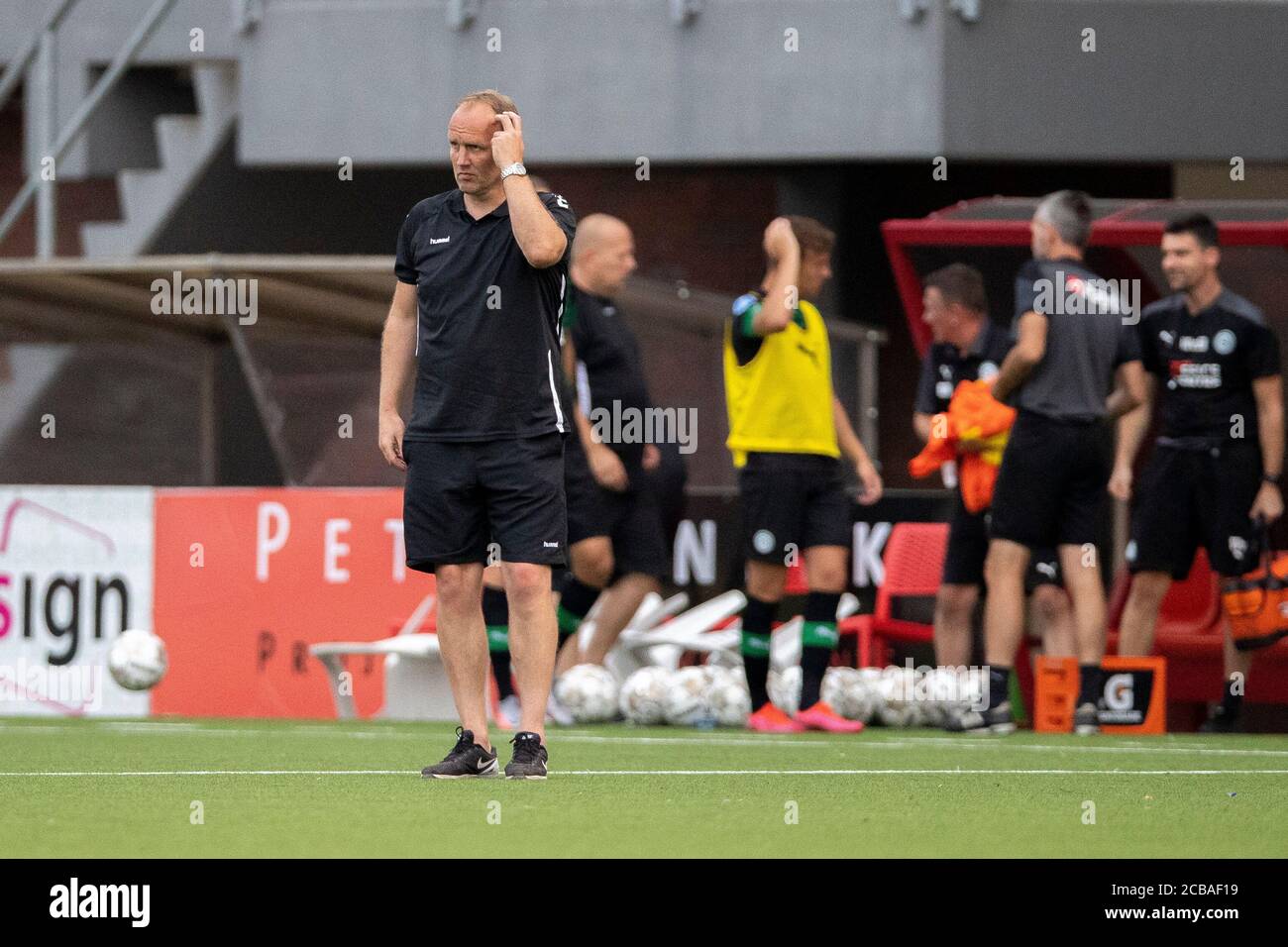 Sinan Bakis signs a contract at Heracles Almelo Stock Photo - Alamy