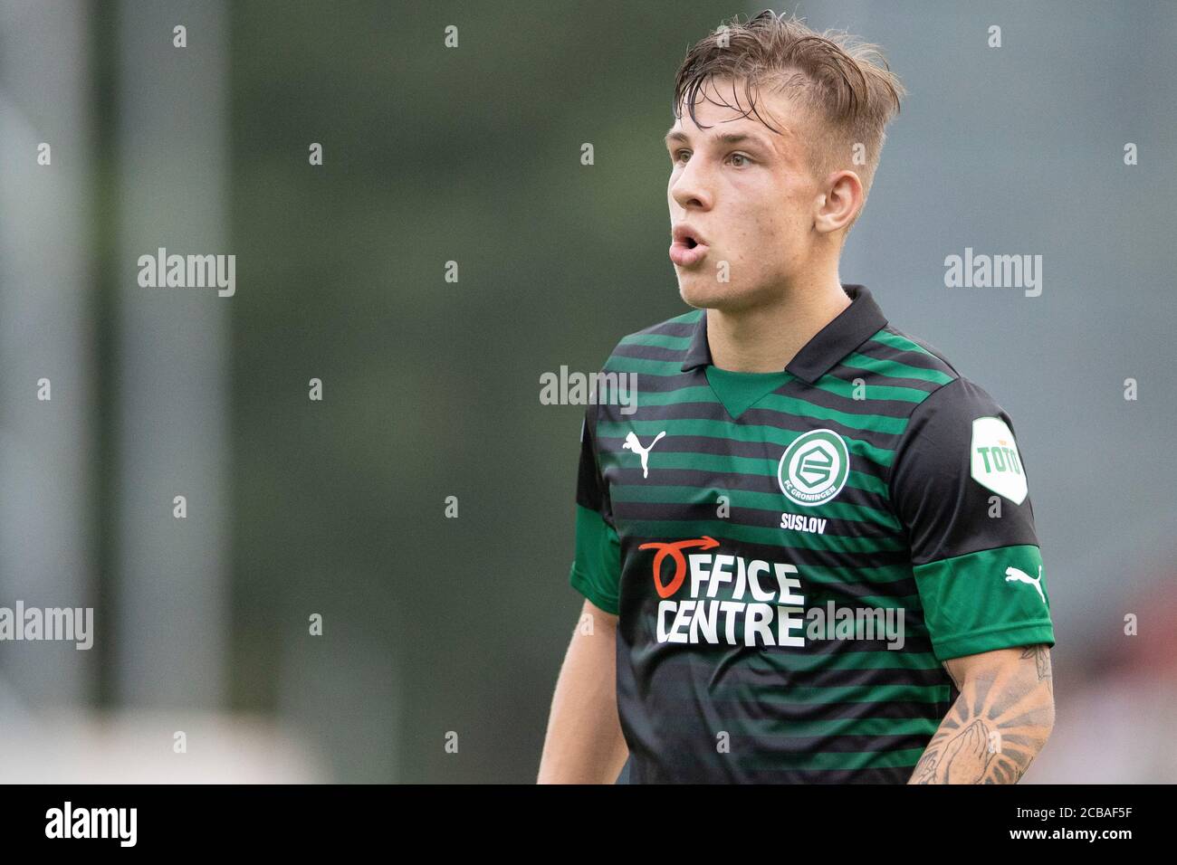 Sinan Bakis signs a contract at Heracles Almelo Stock Photo - Alamy