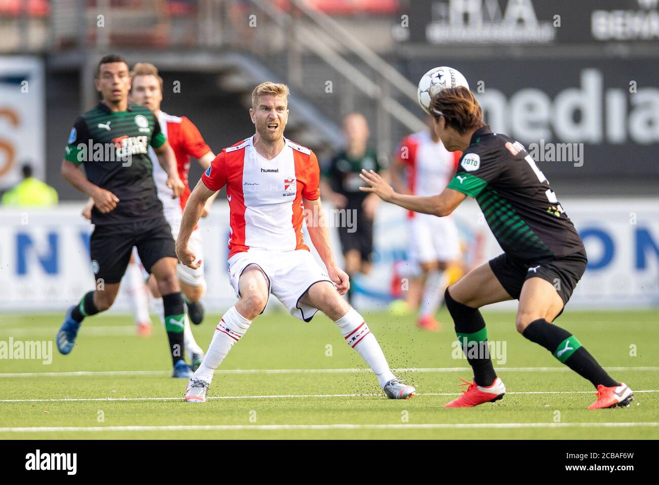 Sinan Bakis signs a contract at Heracles Almelo Stock Photo - Alamy