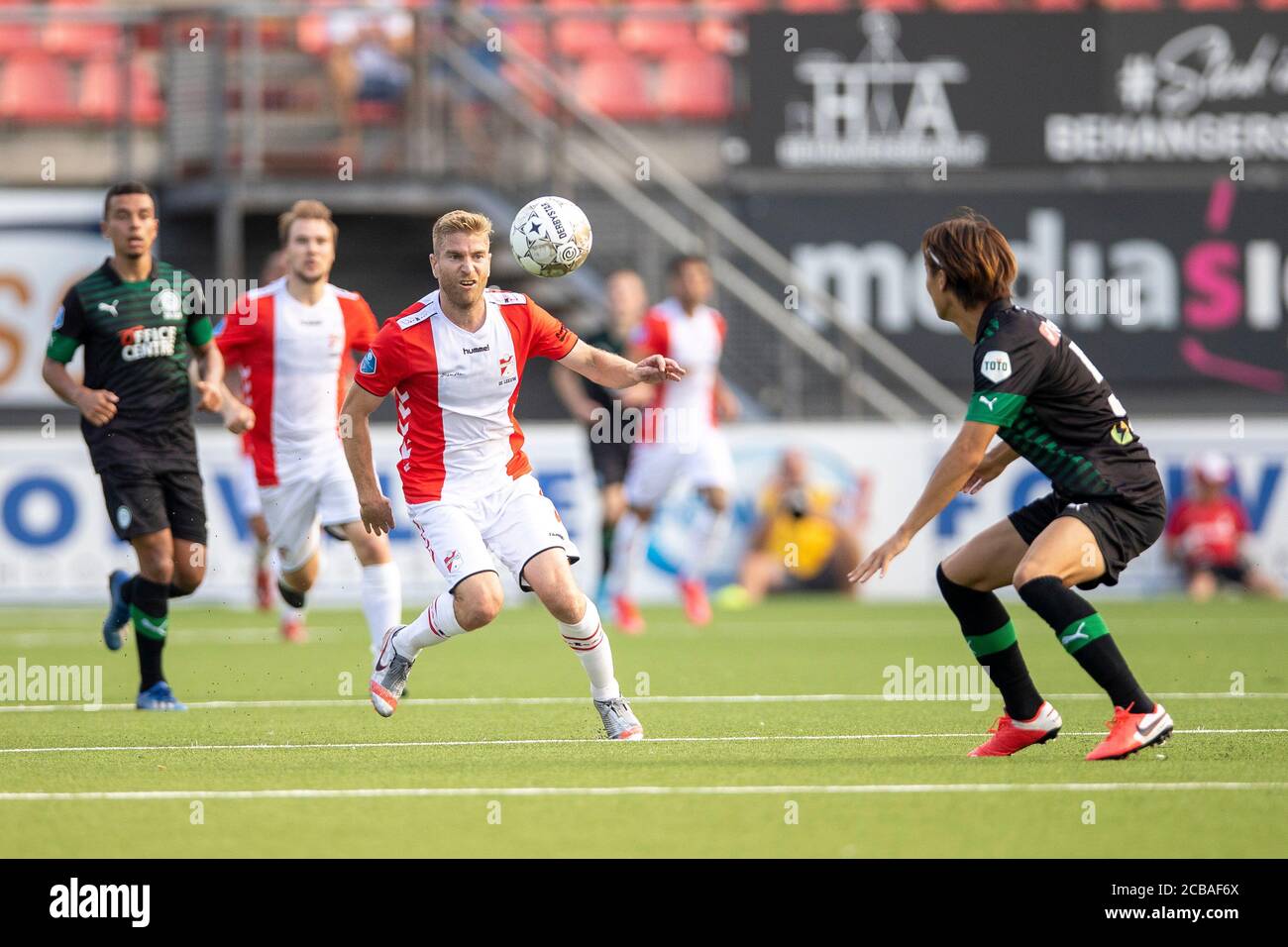 Sinan Bakis signs a contract at Heracles Almelo Stock Photo - Alamy