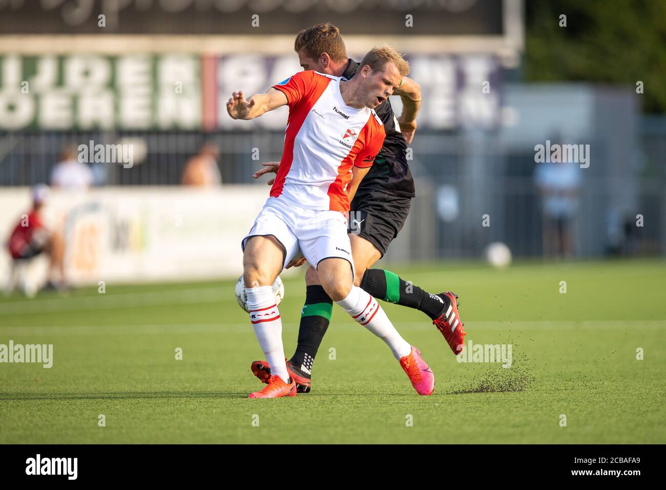 Sinan Bakis signs a contract at Heracles Almelo Stock Photo - Alamy