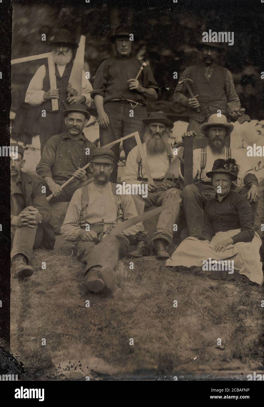 A Woman and Eight Carpenters Posed Outdoors, 1880s Stock Photo - Alamy