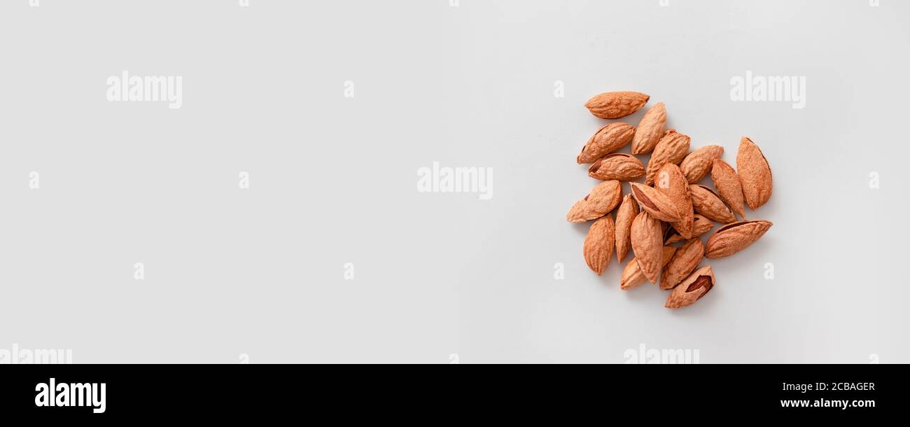 Top view composition of fresh almonds nuts bunch with copy space on ...