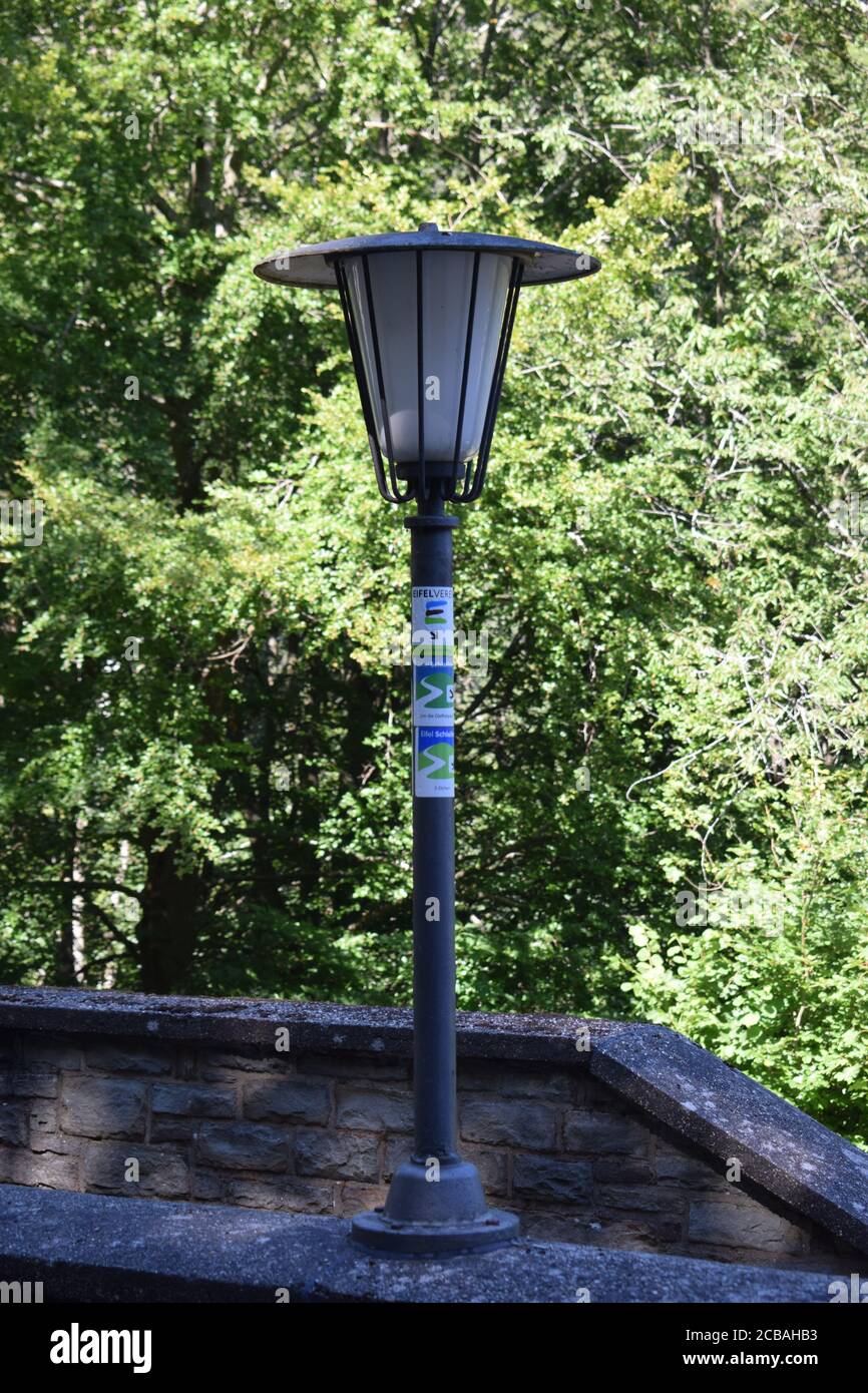 lamp post with hiking signs Stock Photo - Alamy
