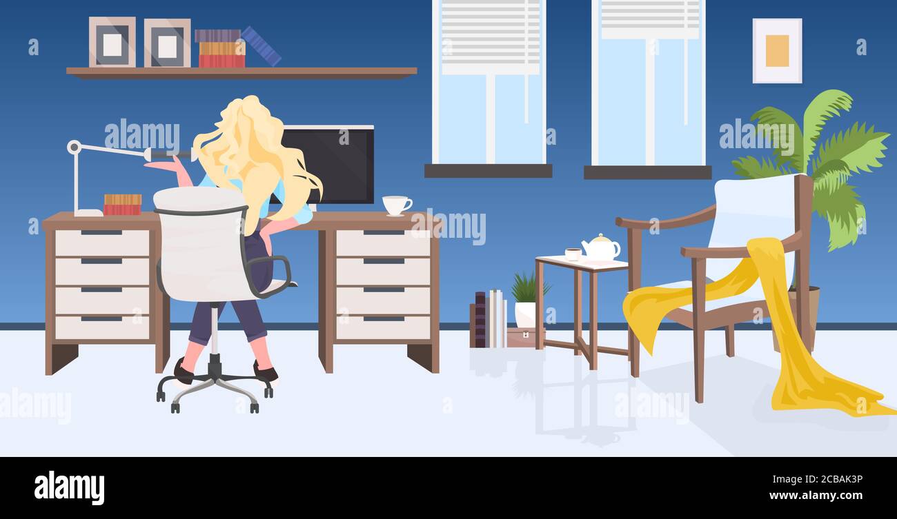 businesswoman sitting at workplace desk social distancing coronavirus ...