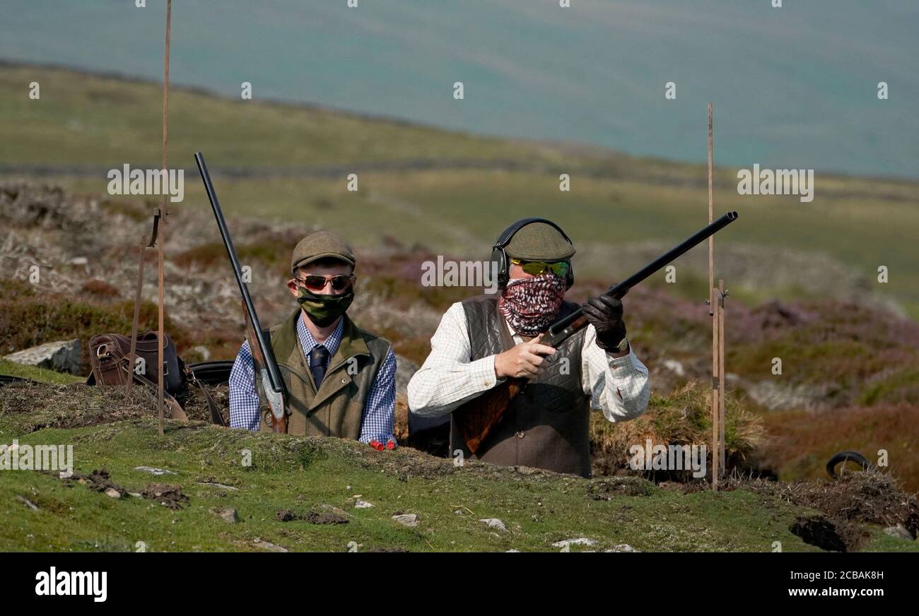 Members of a shooting party on the Yorkshire moors as the Glorious 12th ...