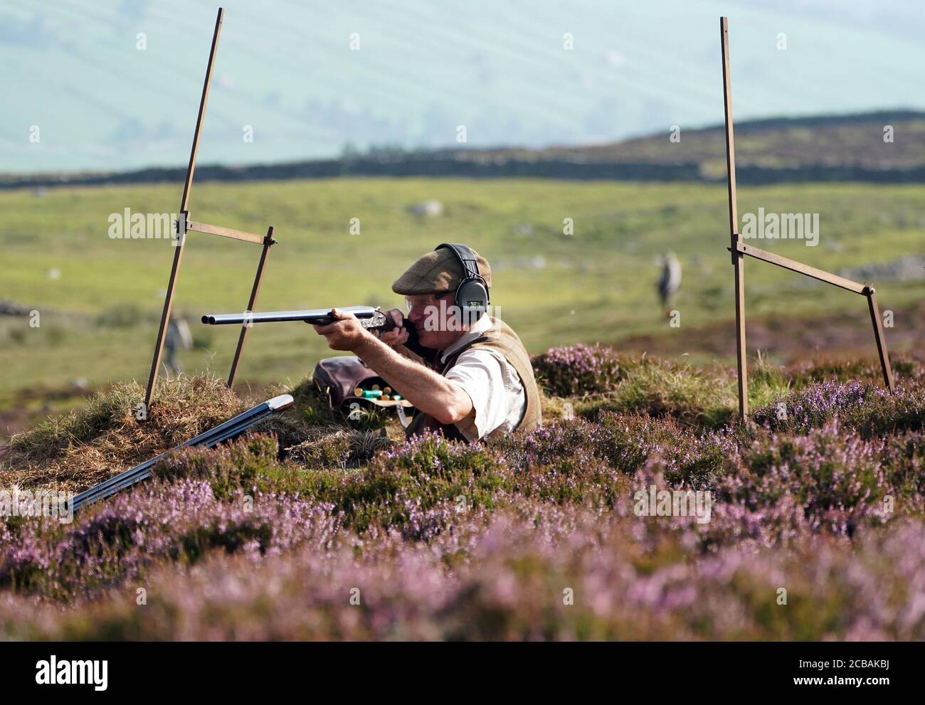 Members of a shooting party on a moor near Grinton, North Yorkshire, as ...
