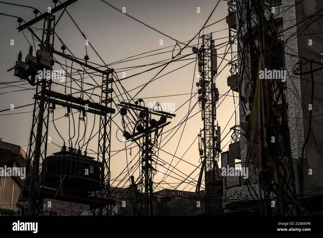 Daily life with power pylons and power cables in the Old Town around ...