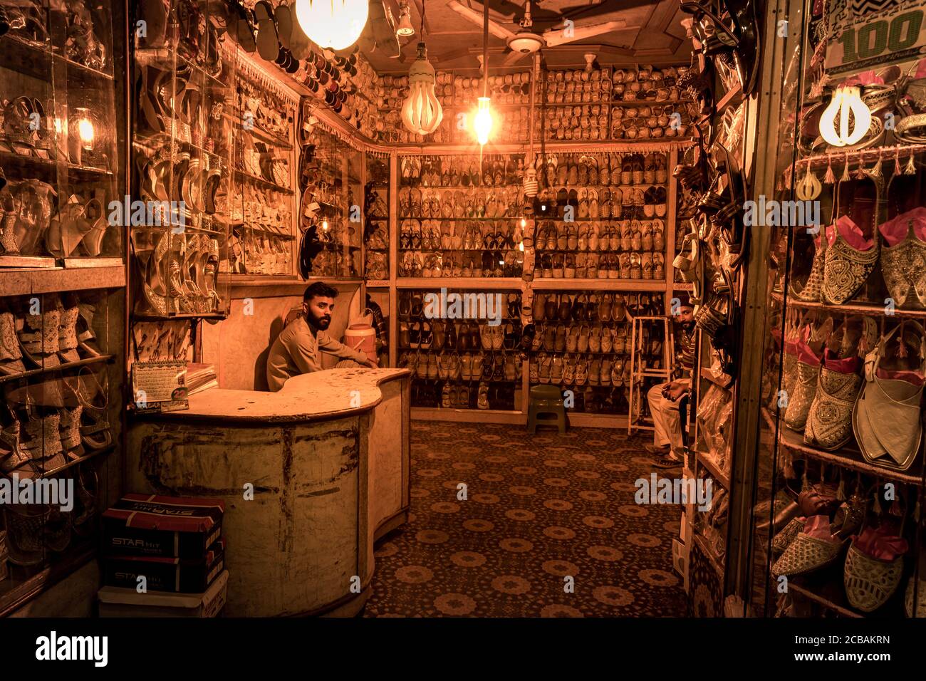 Shoe shop in the Old Town around the Badshahi Mosque, the UNESCO World ...