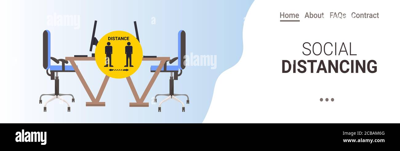 office workplace desk with sign for social distancing yellow sticker ...