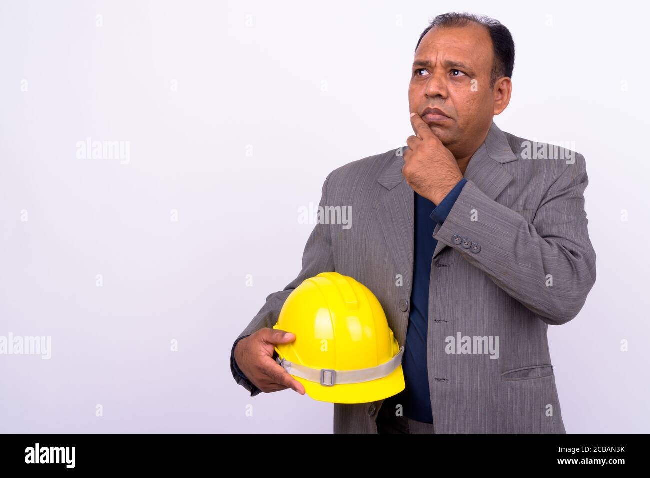 Portrait of mature overweight Indian businessman as engineer Stock ...